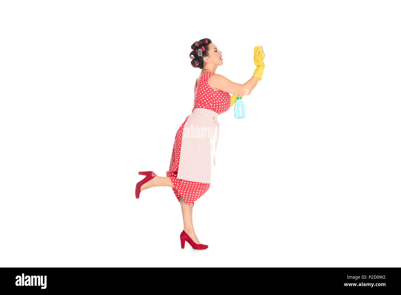 attractive plus size woman in rubber gloves with cleaning supplies ...