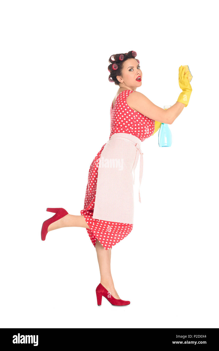 emotional plus size woman in rubber gloves with cleaning supplies ...