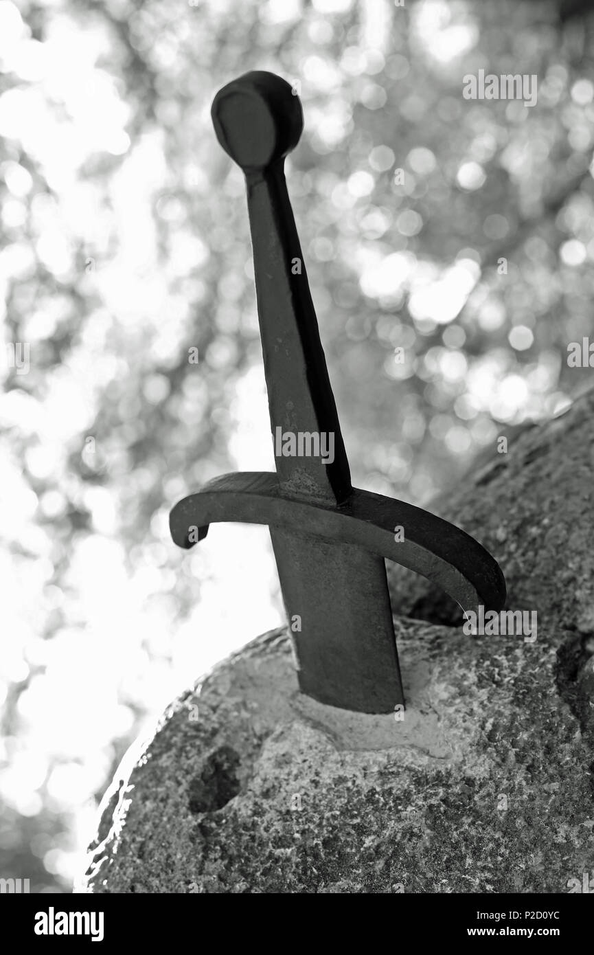 Magic Sword Excalibur in the stone with black and white effect Stock ...