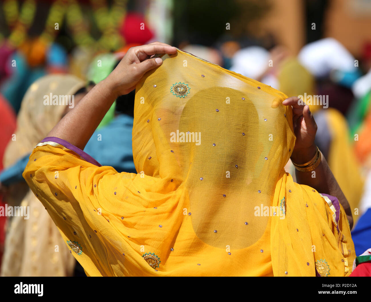 Sikh woman in crowd religious hi-res stock photography and images - Alamy
