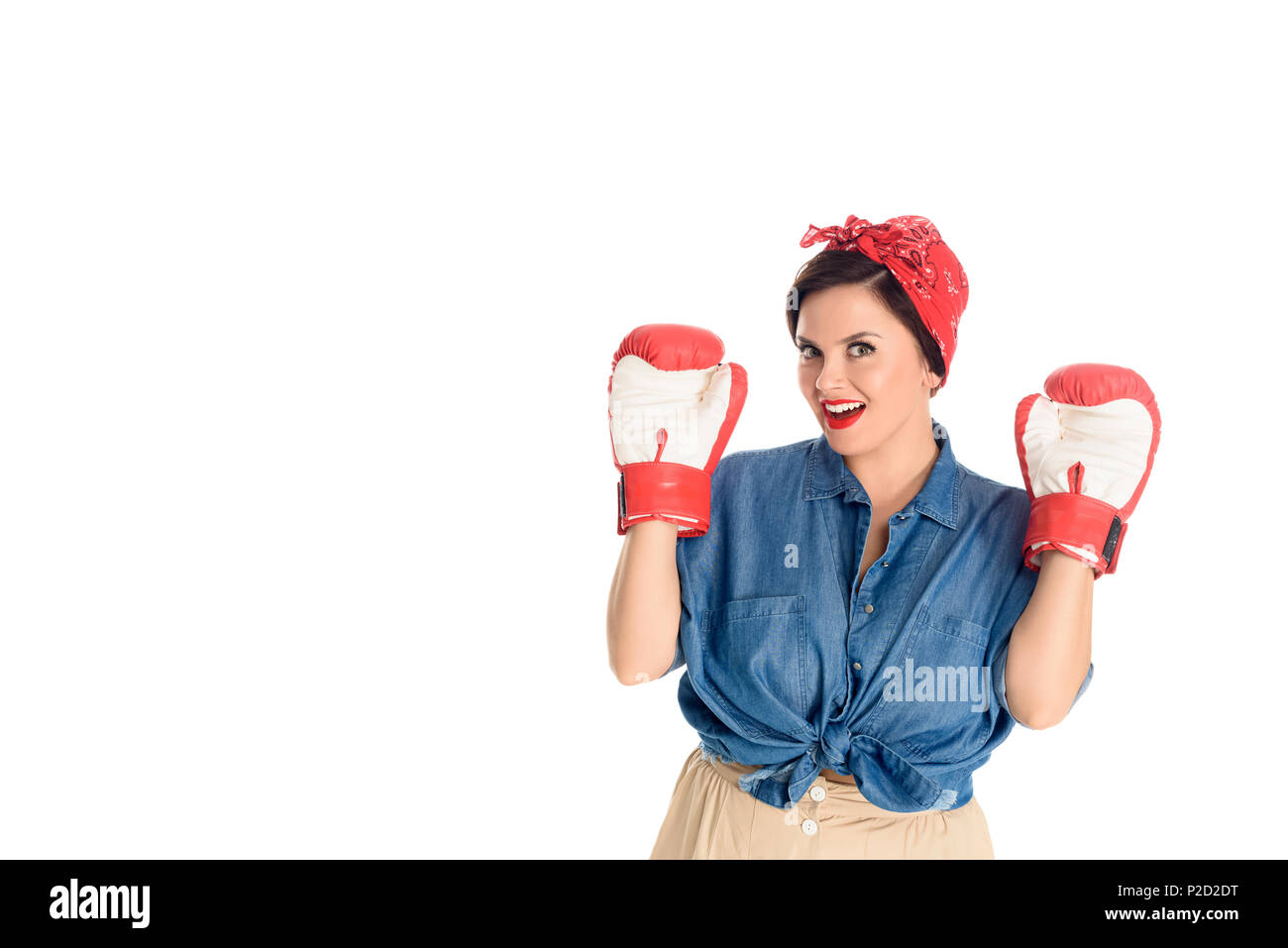 beautiful pin up woman in boxing gloves smiling at camera isolated on ...