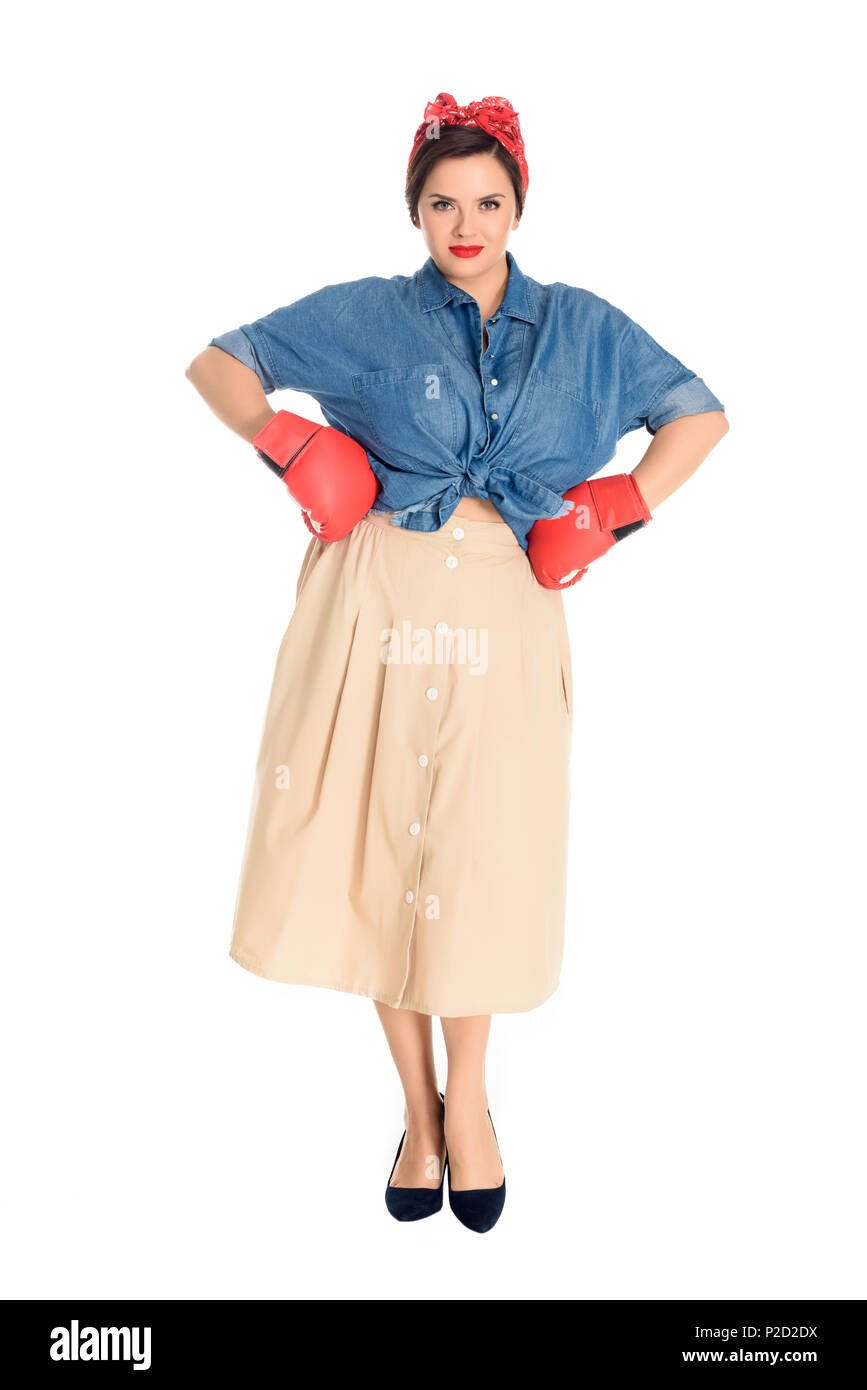 beautiful pin up woman in boxing gloves standing with hands on waist ...