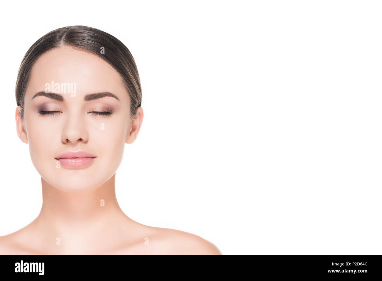 attractive young woman with eyes shut isolated on white Stock Photo - Alamy