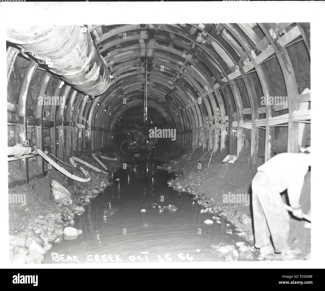 . English: Photo showing construction of the outflow channel used to ...