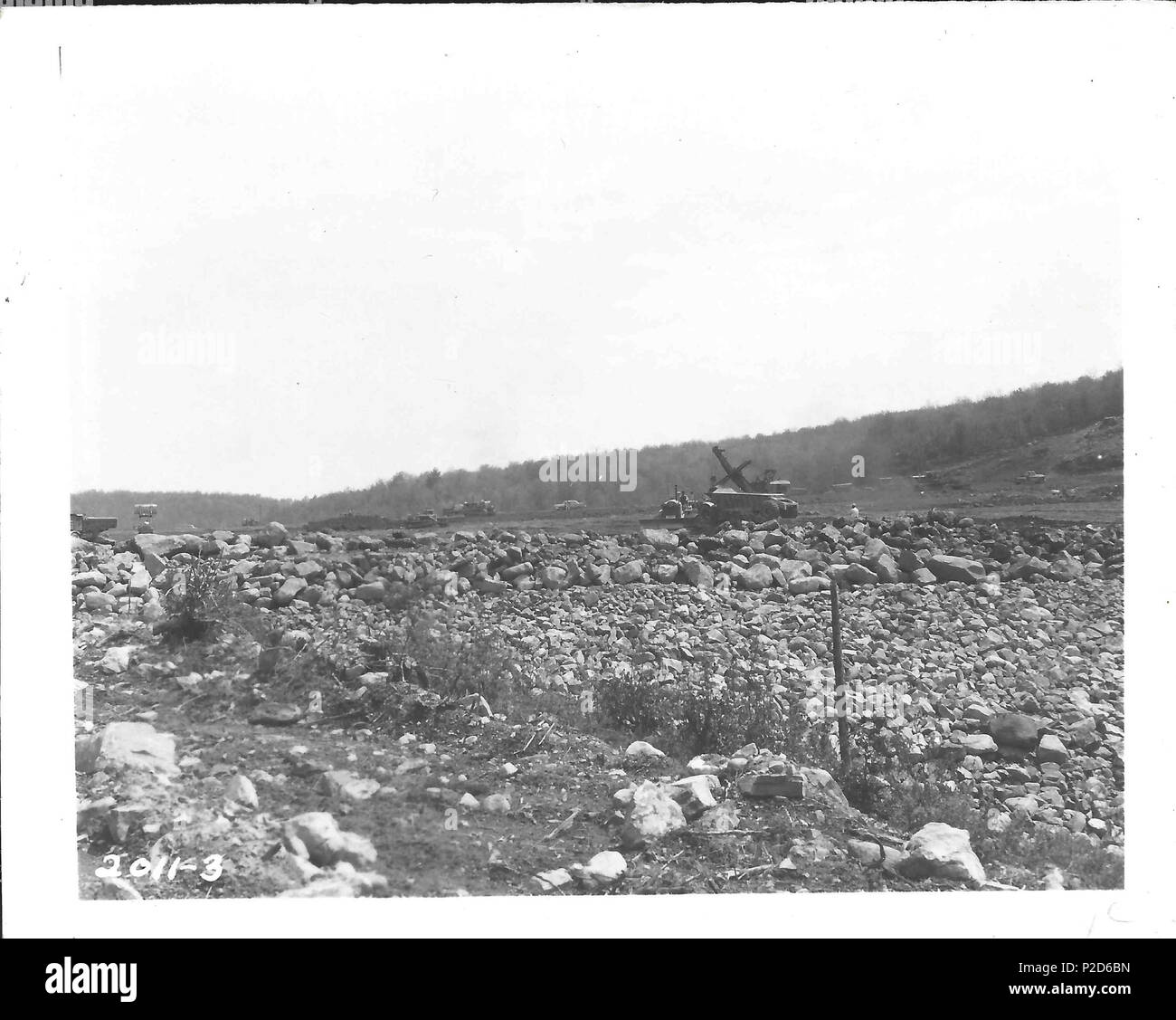 . English: A wire rope shovel excavates the site at the Francis E ...