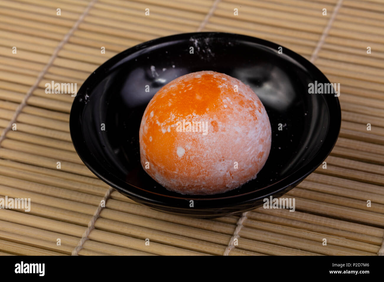 Delicious passionfruit daifuku rice desert Stock Photo - Alamy