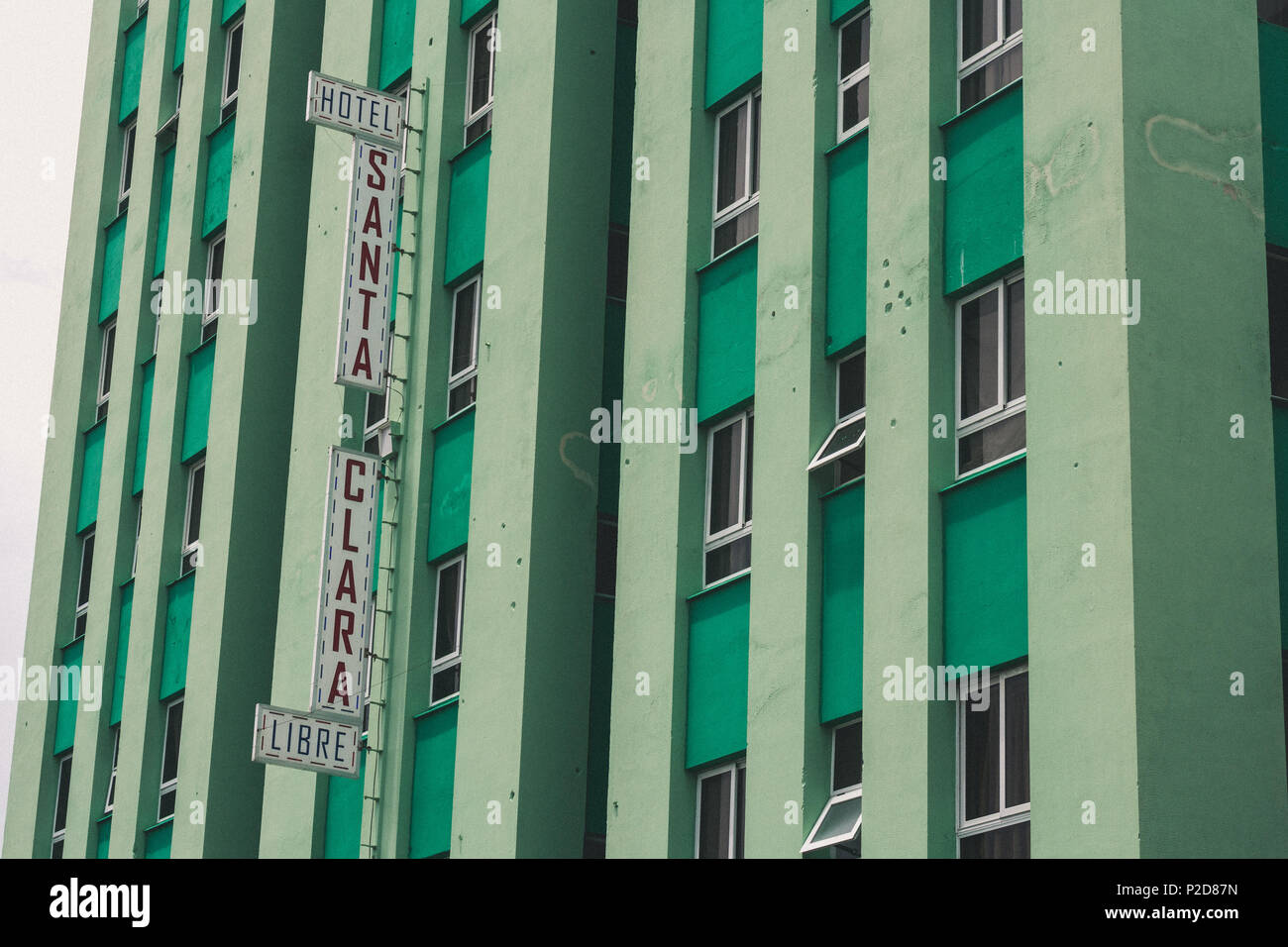 Green frontage with bulletholes at Hotel Santa Clara, Cuba Stock Photo ...