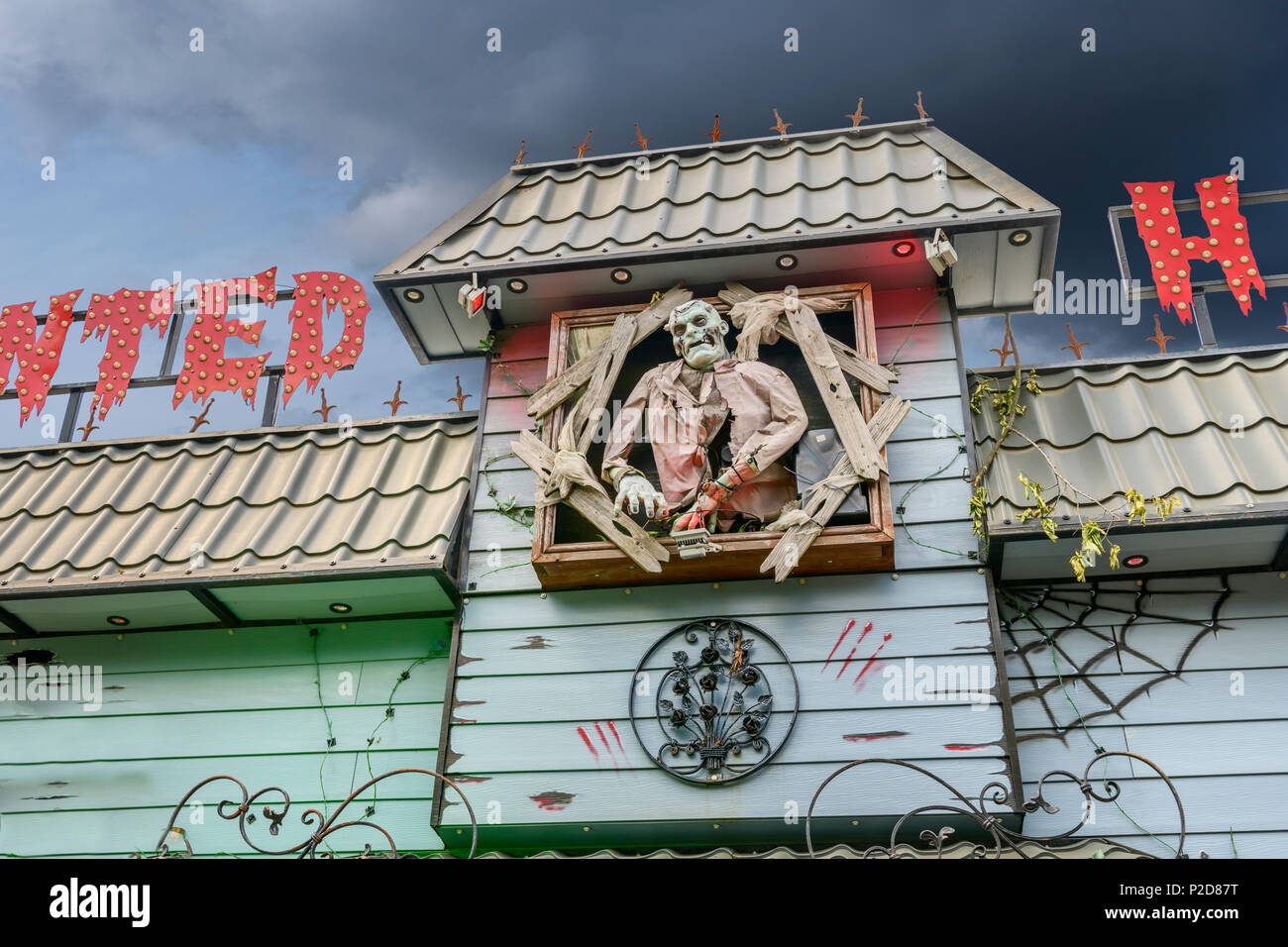 Monster above a haunted house Stock Photo - Alamy