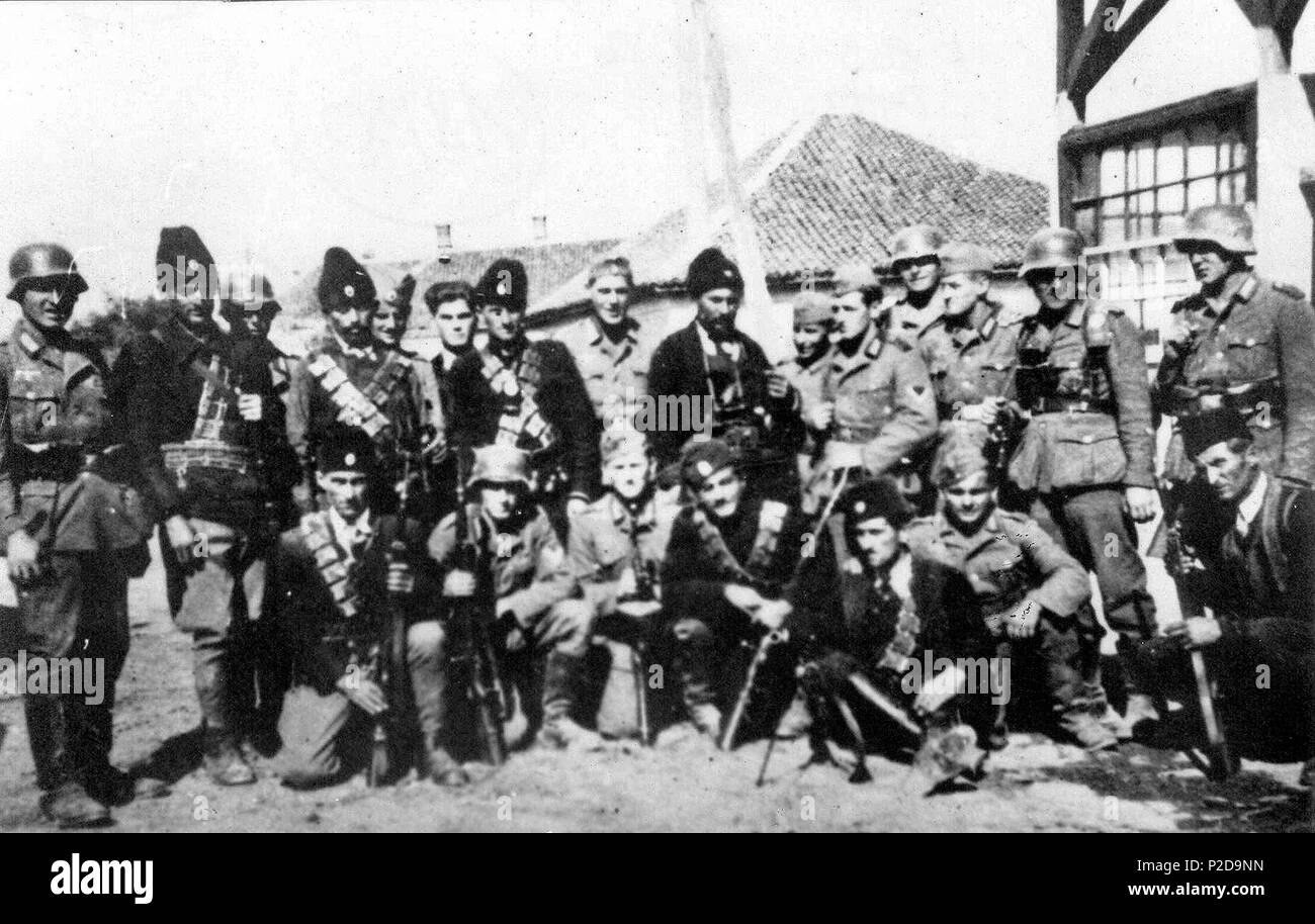 . English: A group of Chetniks pose with German soldiers in an ...