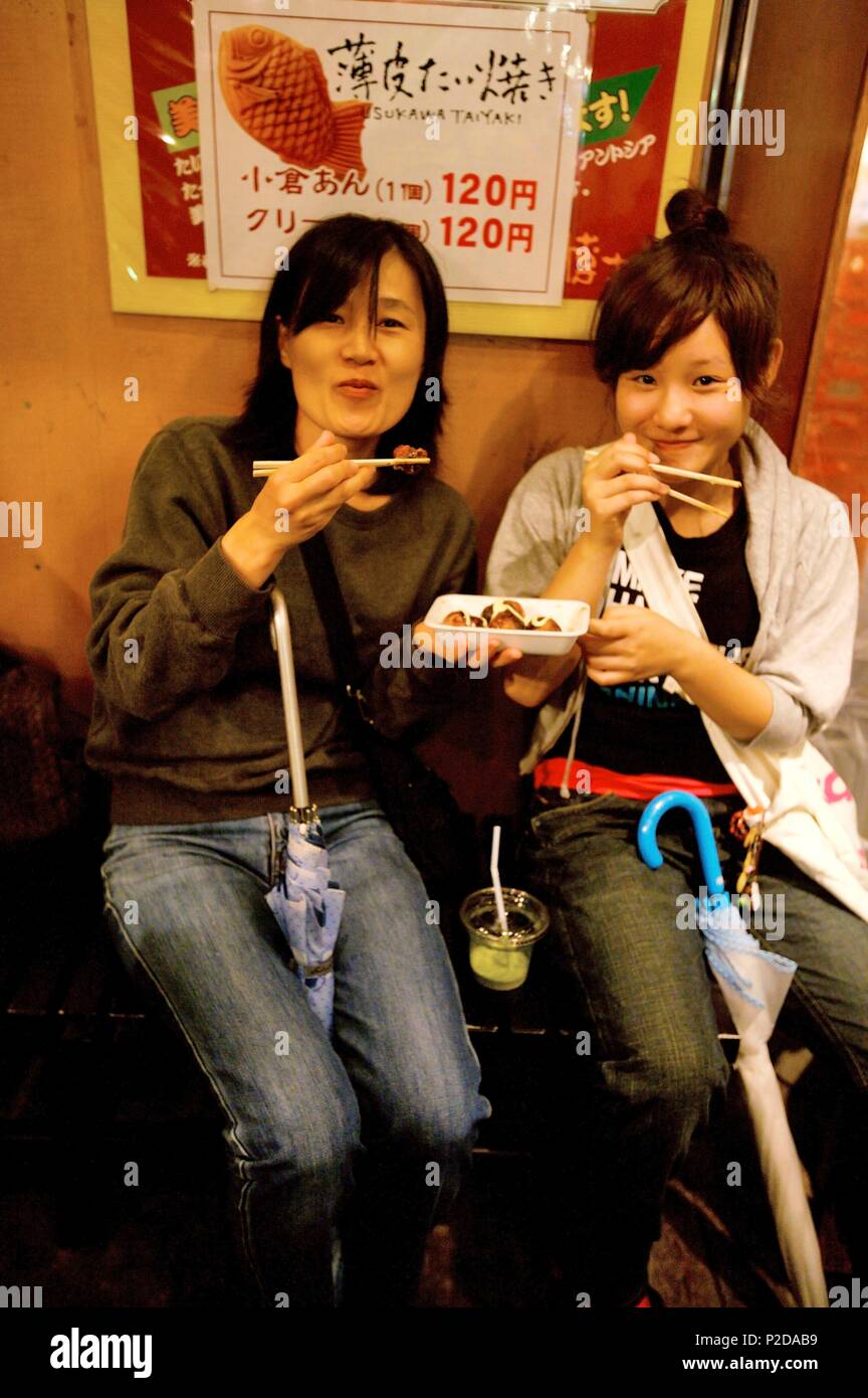 Japan, Honshu island, Kansai region, Kyoto, Takoyaki octopus meatballs ...