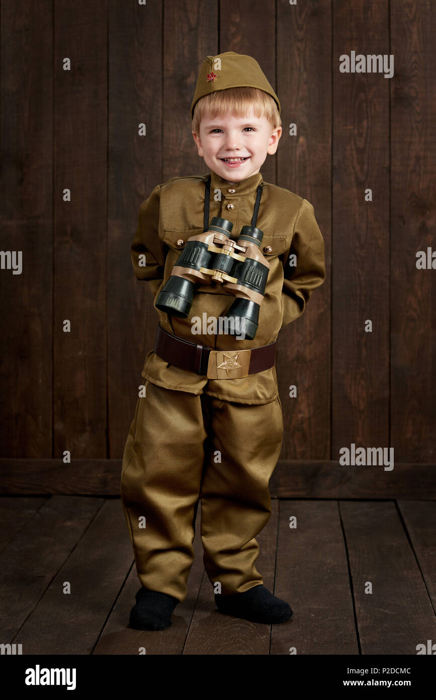 children are dressed as soldier in retro military uniforms Stock Photo ...