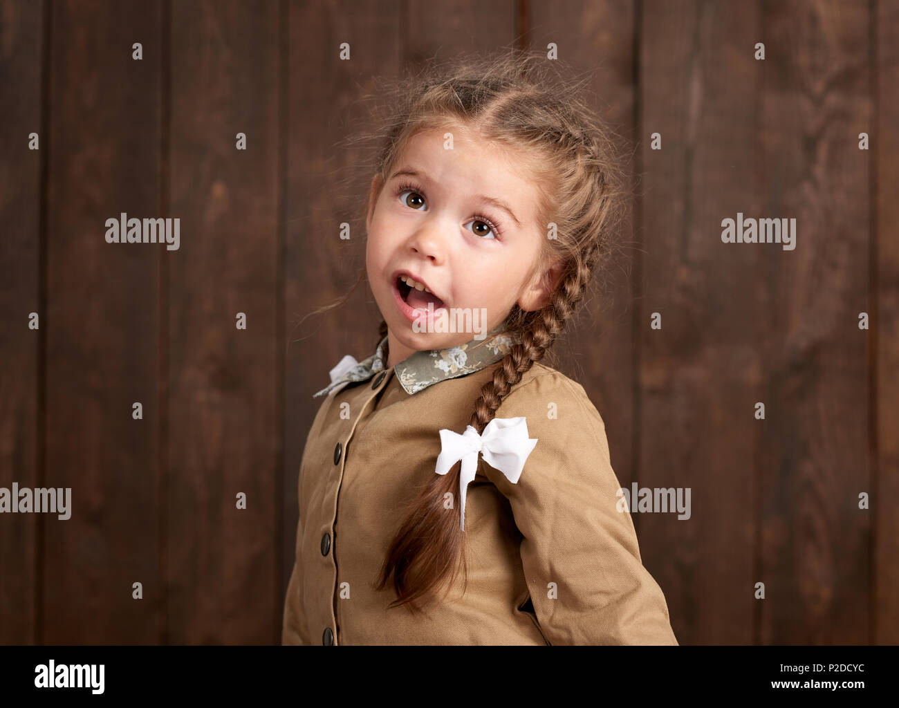 child girl are dressed as soldier in retro military uniforms Stock ...