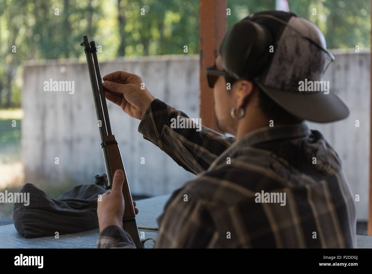 Checking gun hi-res stock photography and images - Alamy