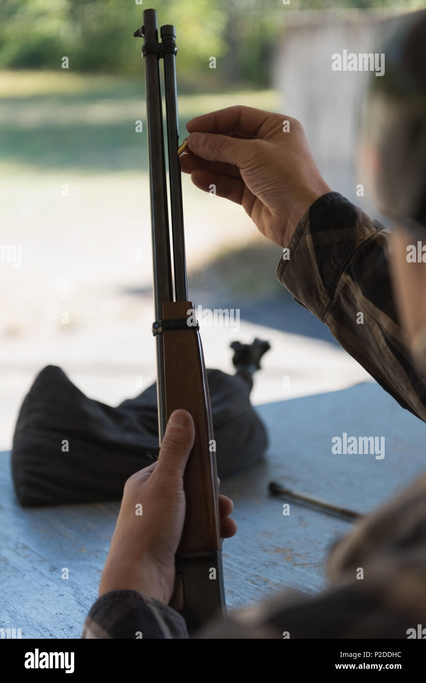 Checking gun hi-res stock photography and images - Alamy
