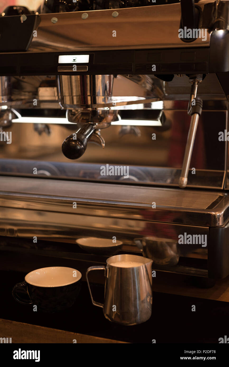 Close-up of espresso near machine Stock Photo - Alamy