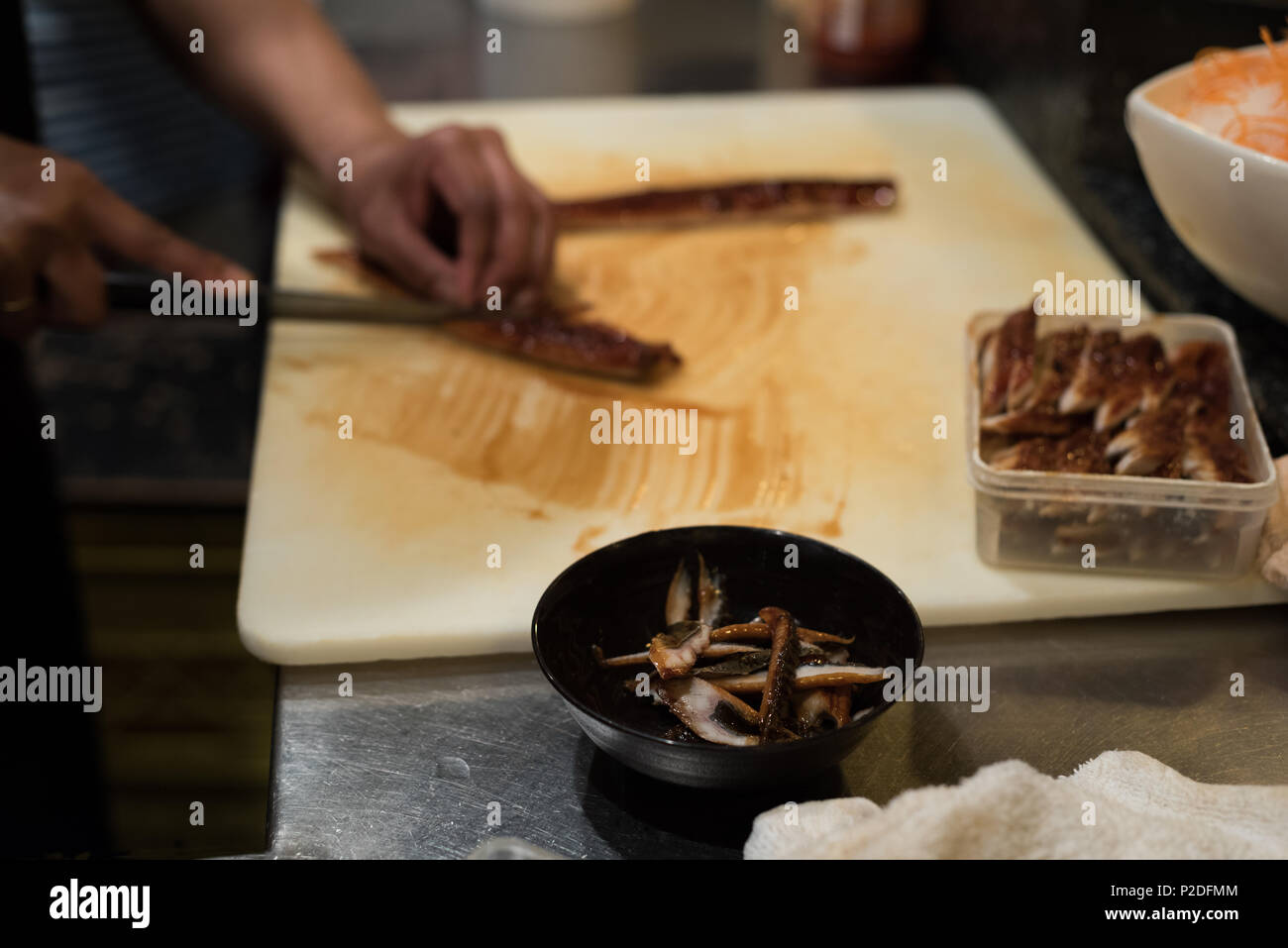 Chef filleting fish in the restaurant kitchen Stock Photo - Alamy