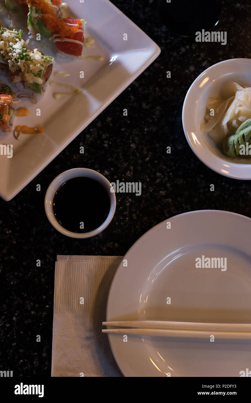 Sushi table arranged in a restaurant Stock Photo - Alamy