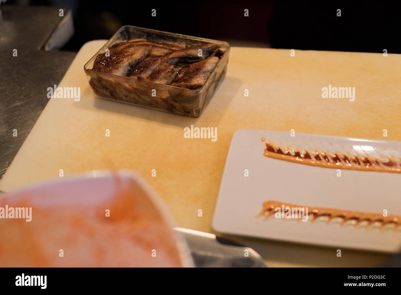 Sushi serving plate garnished with sauce Stock Photo - Alamy