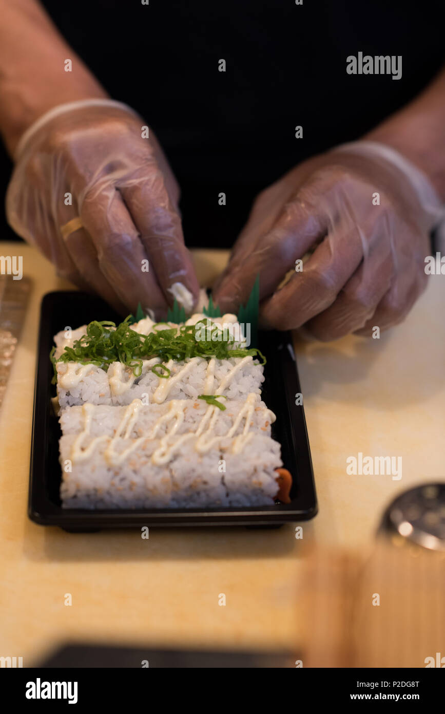 Garnishing fish hi-res stock photography and images - Alamy