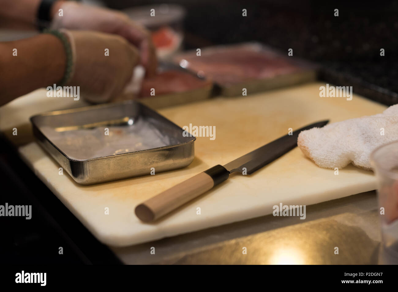 Chef filleting fish in the restaurant kitchen Stock Photo - Alamy