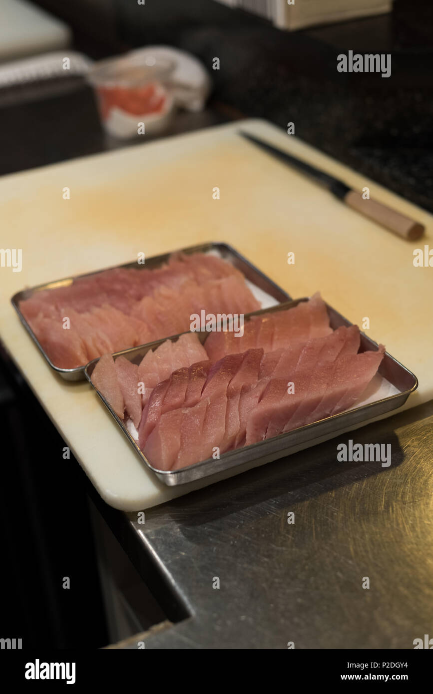 Filleted fish kept in a tray Stock Photo - Alamy