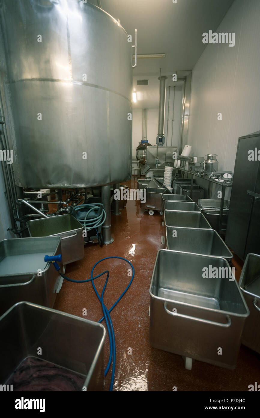 Distillery and containers in the factory Stock Photo - Alamy