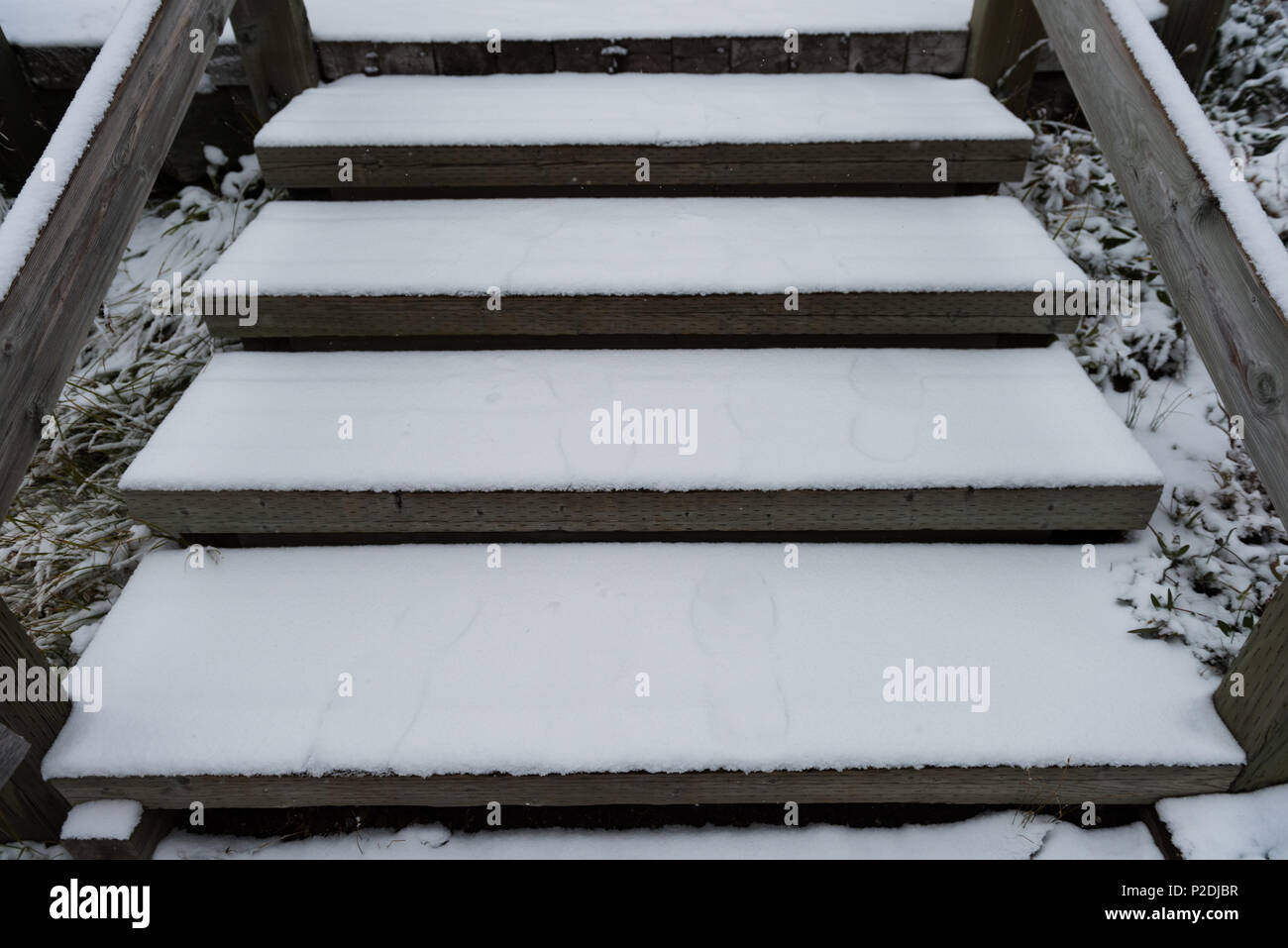 Wooden steps covered with snow Stock Photo - Alamy