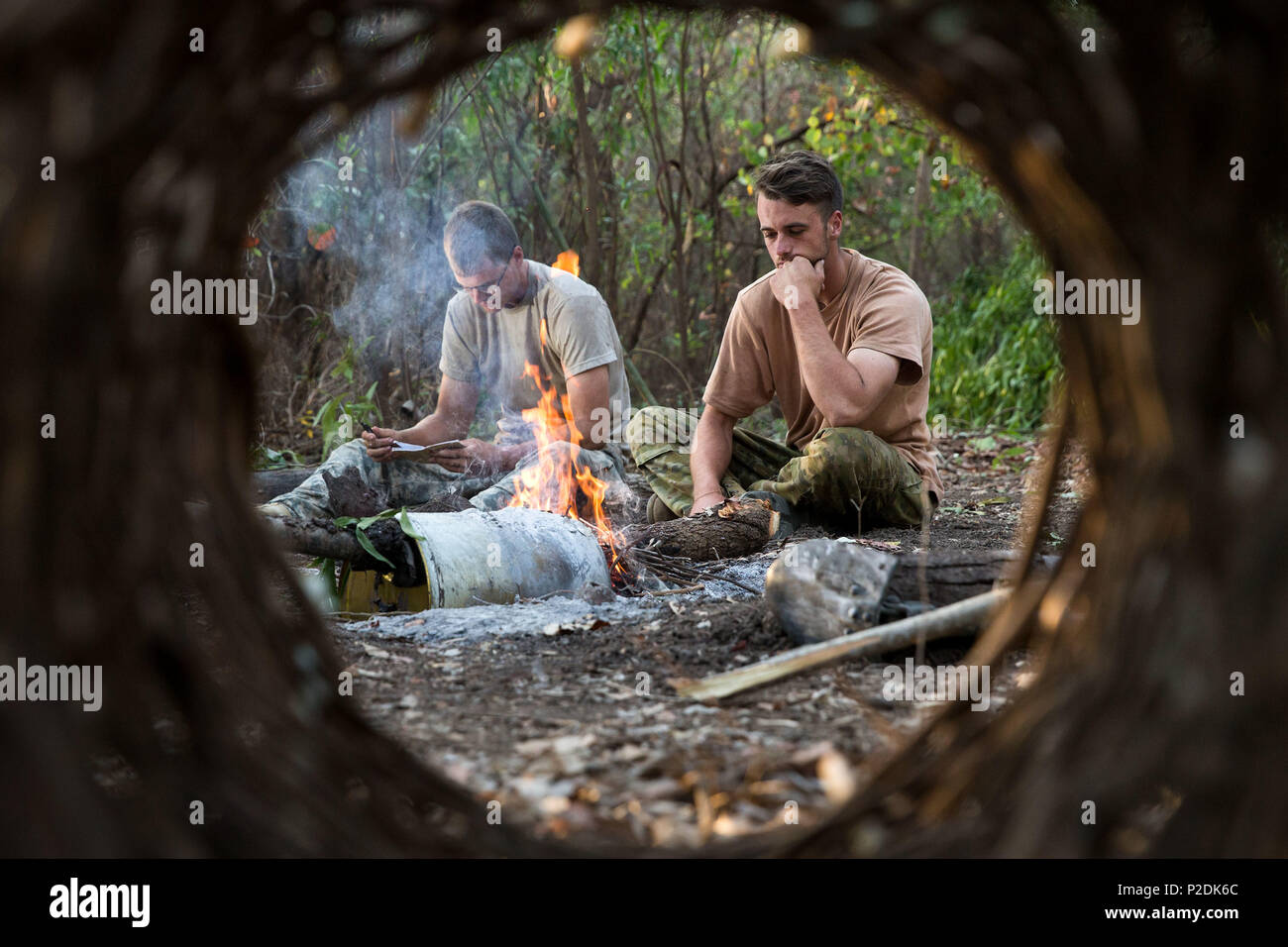 Australian Army Trooper Dean Hassall boils drinking water during the ...