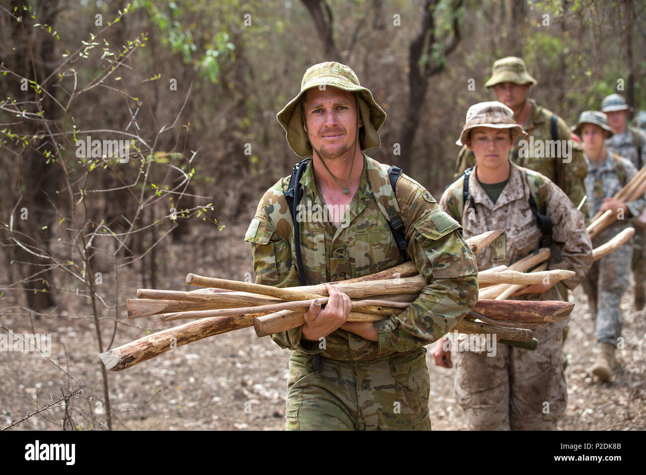Australian Army Sgt. Dominic Hamon walks off into the Daly River scrub ...