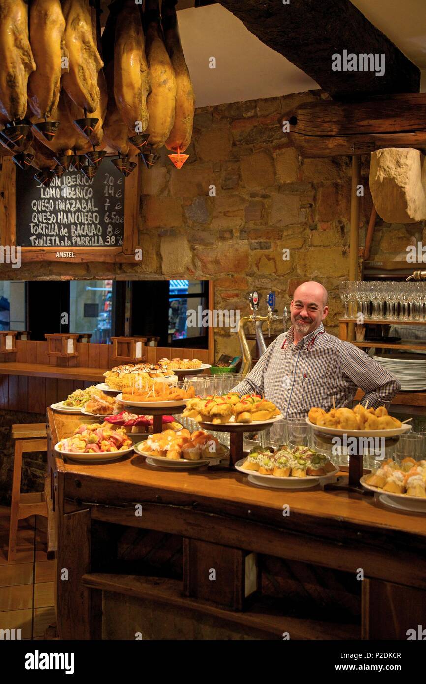 Spain, Basque country, San Sebastian, Owner of the Aralar bar in front ...
