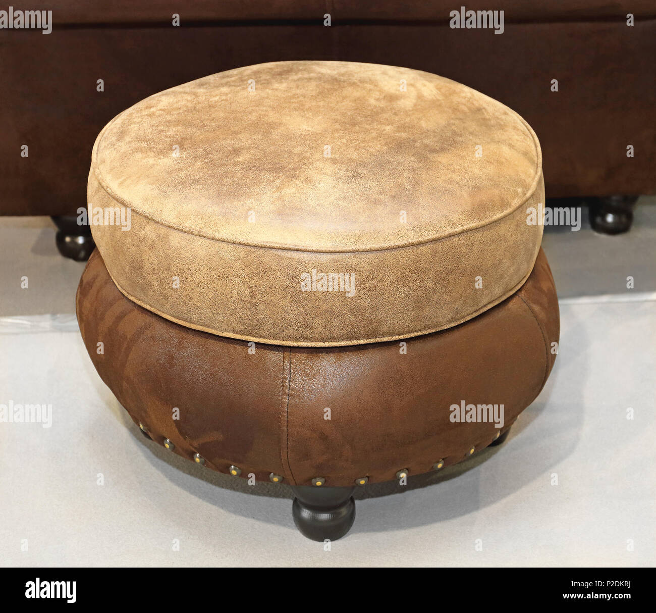 Brown Leather Footstool With Pillow Stock Photo - Alamy