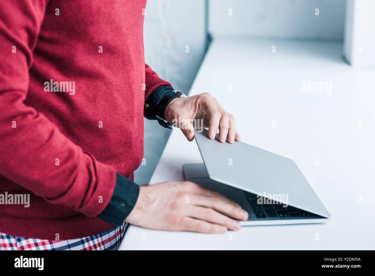 Opening laptop hi-res stock photography and images - Alamy