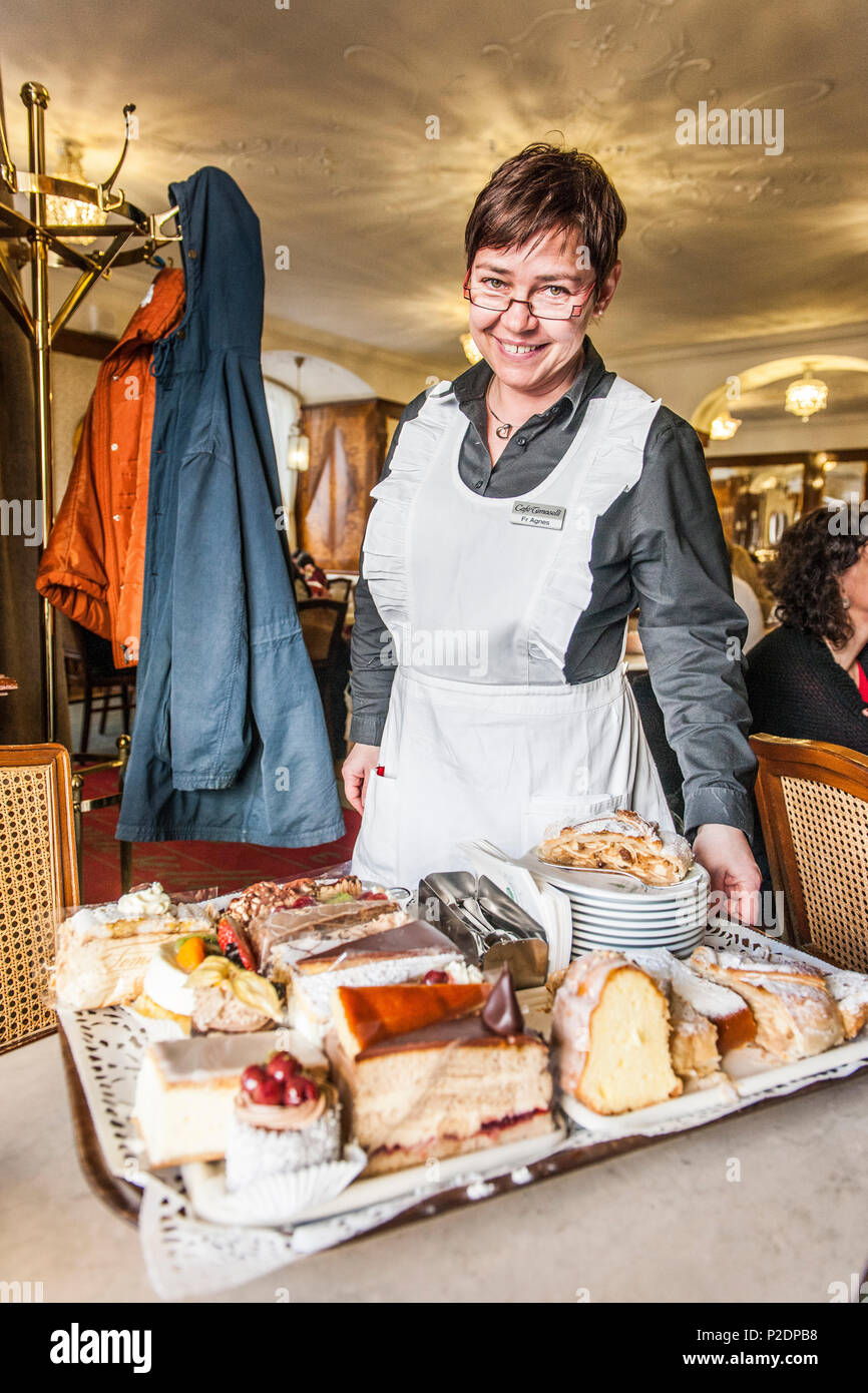 Waitress in the traditional cafe Tomaselli, Salzburg, Austria, Europe ...