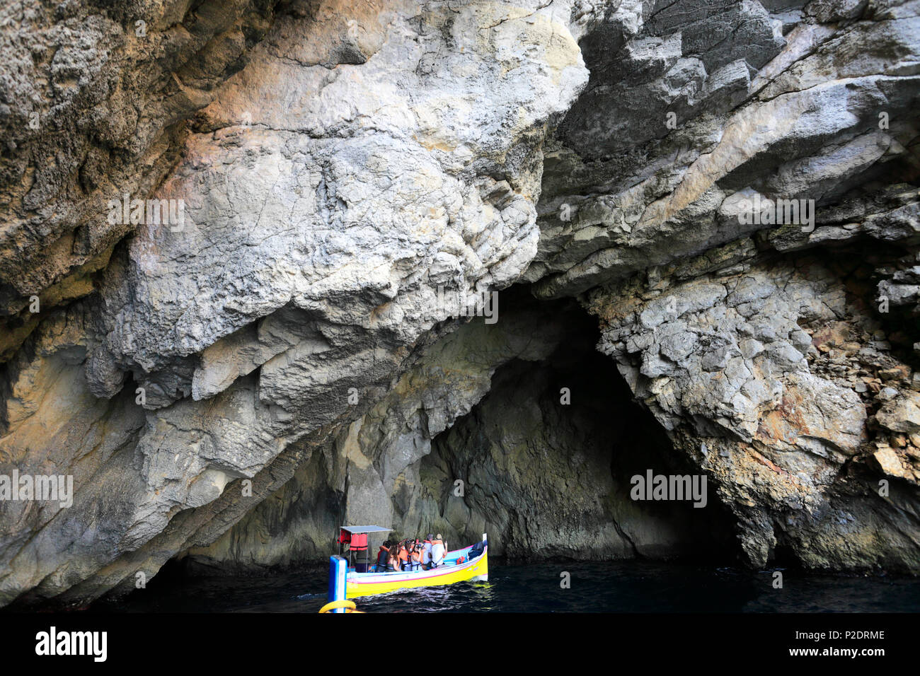 The Blue Grotto sea caves near the fishermen's harbour of Wied iz ...