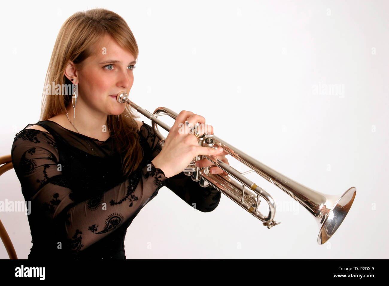 female musician playing the B flat Trumpet - generic Stock Photo - Alamy