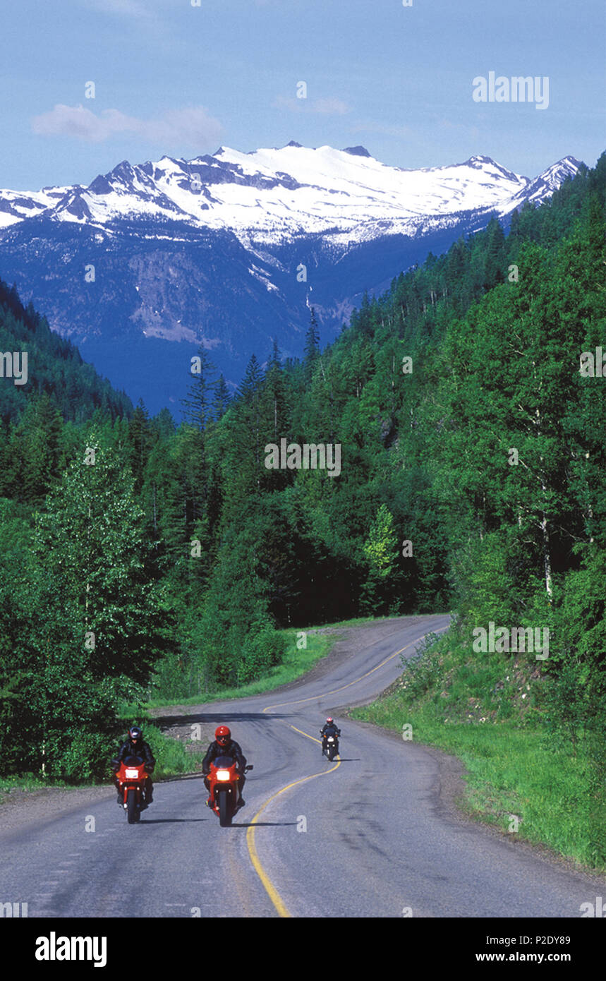 . English: Two motocyclists zoom along the The International Selkirk ...