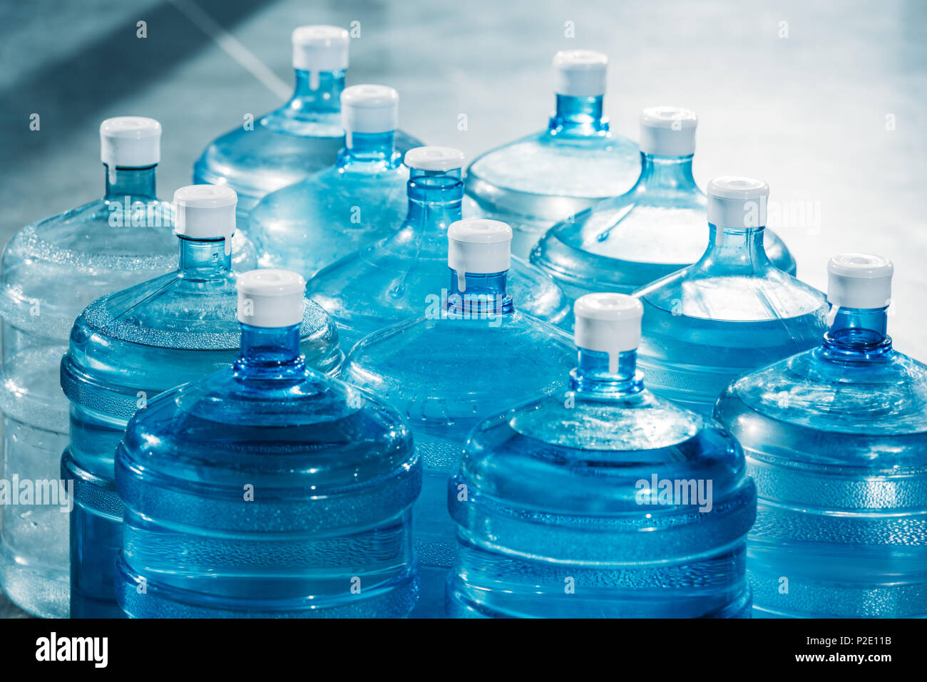 Large blue water bottles hi-res stock photography and images - Alamy
