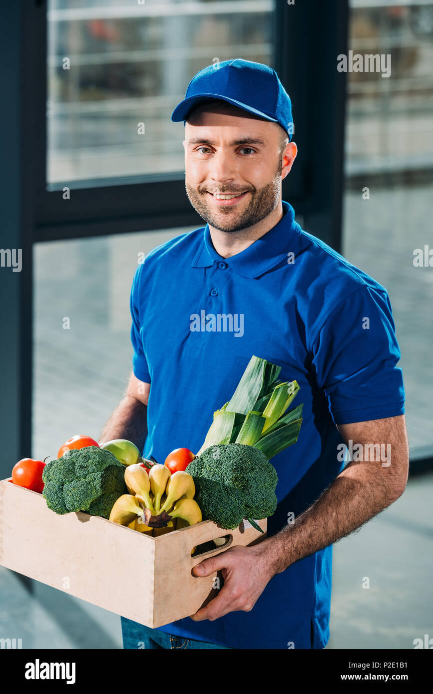 Person delivering vegetable box hi-res stock photography and images - Alamy