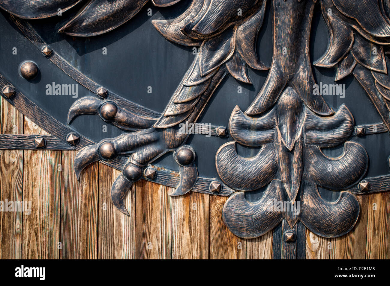 wooden gate with wrought iron elements close up Stock Photo - Alamy