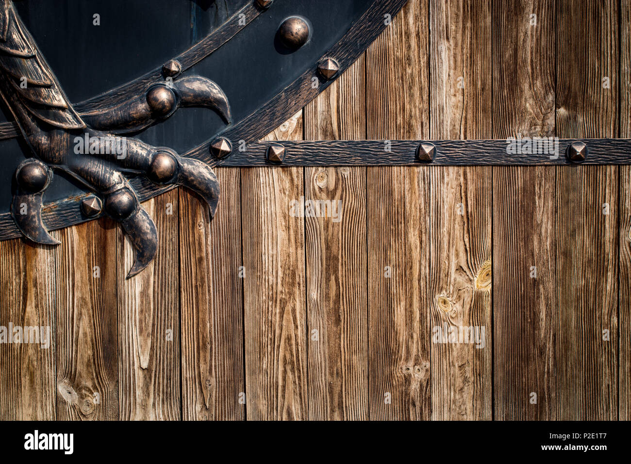 wooden gate with wrought iron elements close up Stock Photo - Alamy