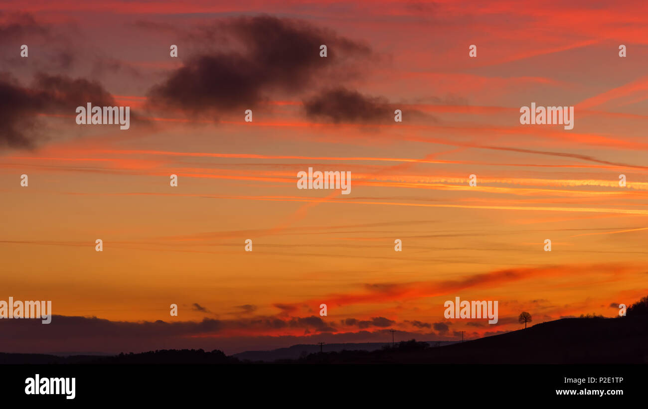 landscape veiled in red clouds Stock Photo - Alamy