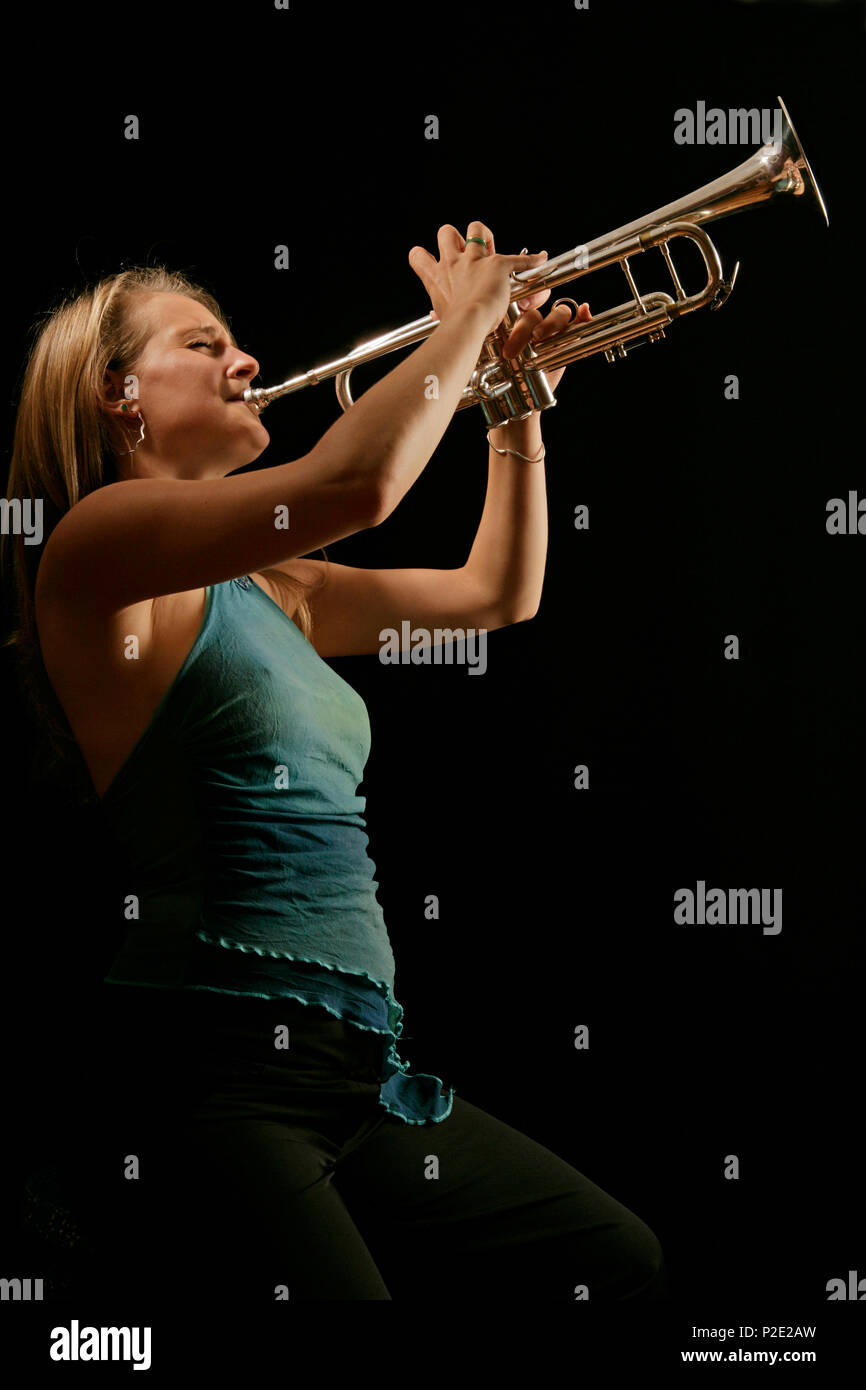 female musician playing the B flat Trumpet - generic Stock Photo - Alamy