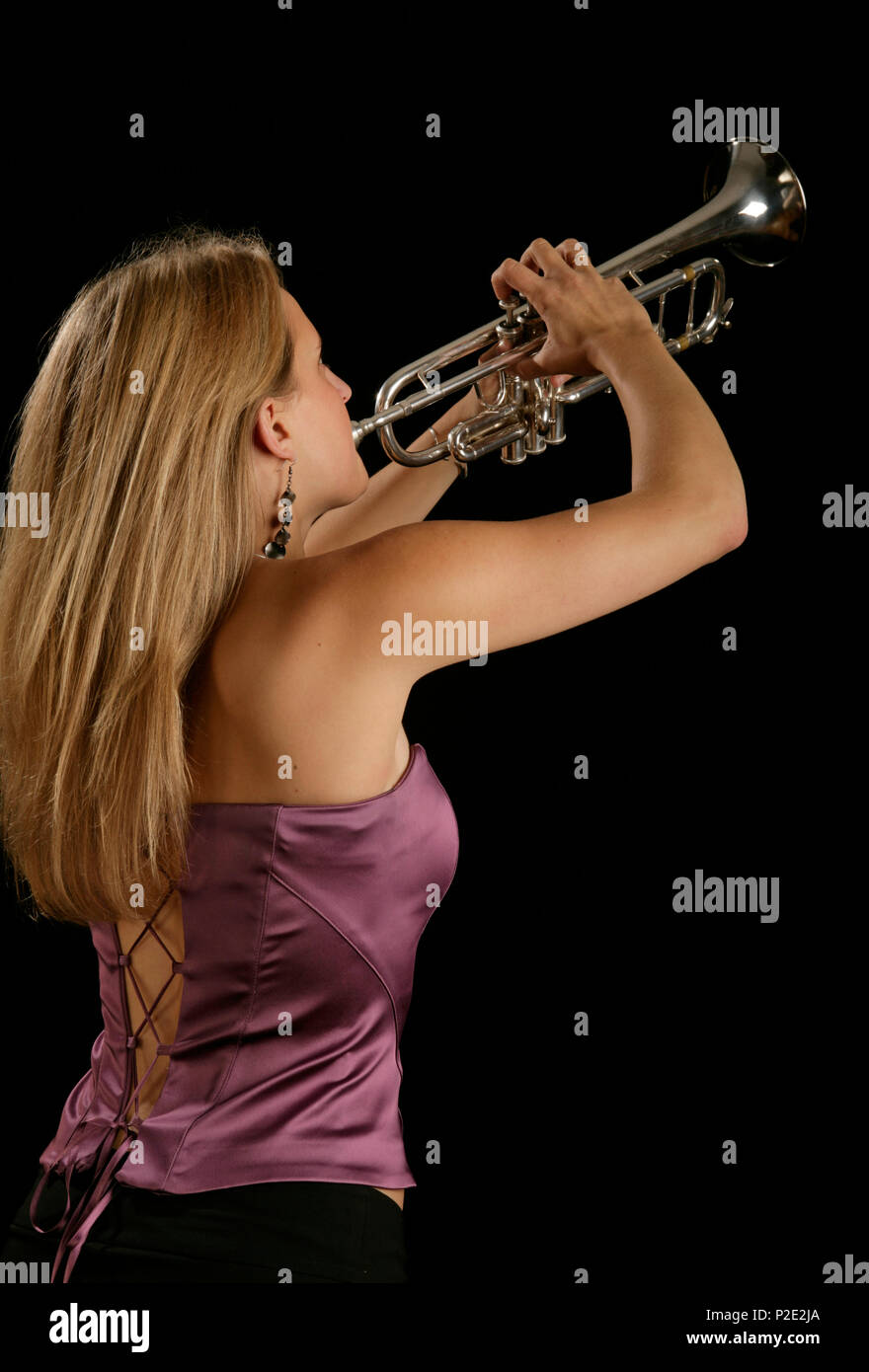 female musician playing the B flat Trumpet - generic Stock Photo - Alamy