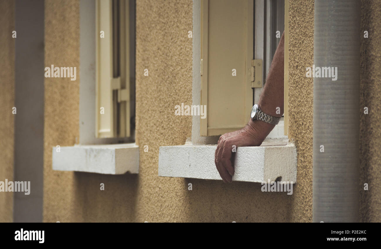 Leaning on window hi-res stock photography and images - Alamy
