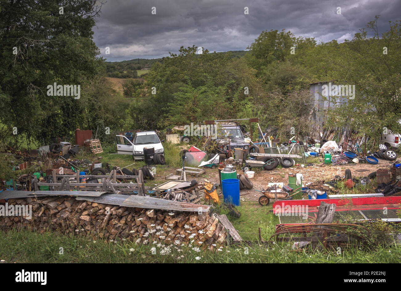 Car wreck old rubbish in green area Stock Photo - Alamy