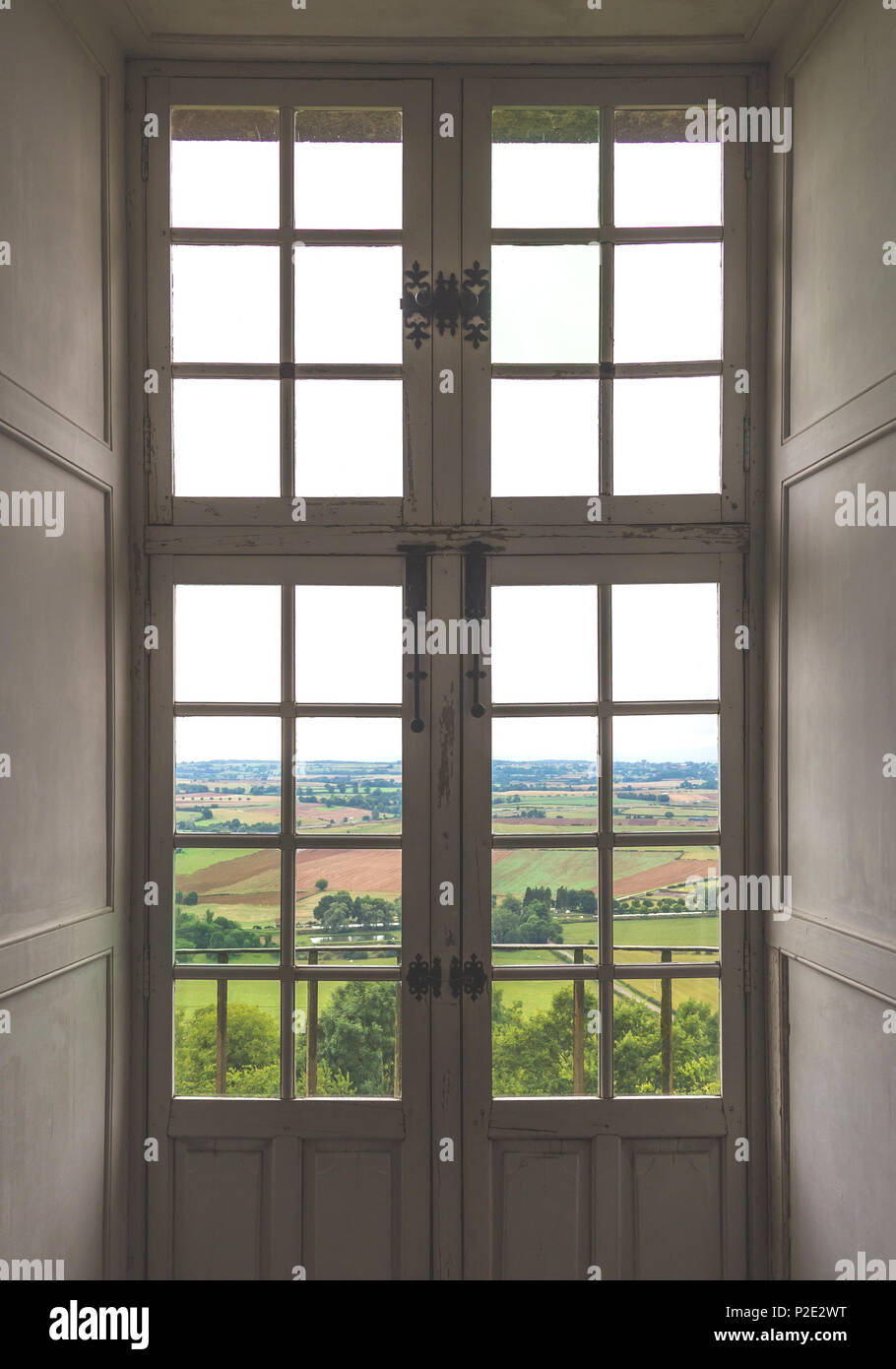 landscape behind a glass castle window Stock Photo - Alamy
