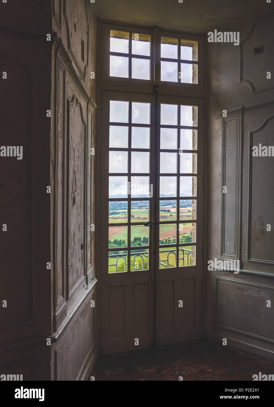 landscape behind a glass castle window Stock Photo - Alamy