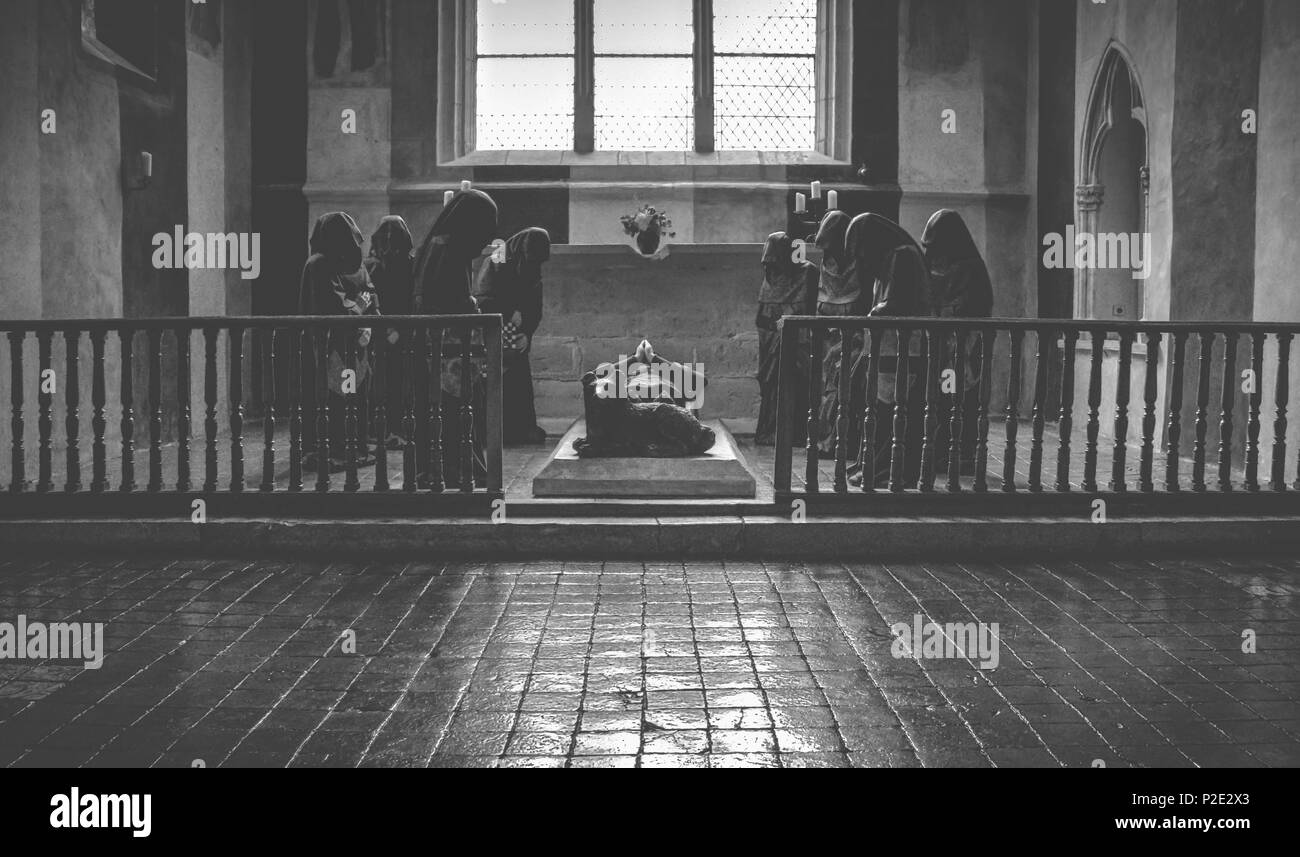 monks praying at a french funeral in a castle Stock Photo - Alamy