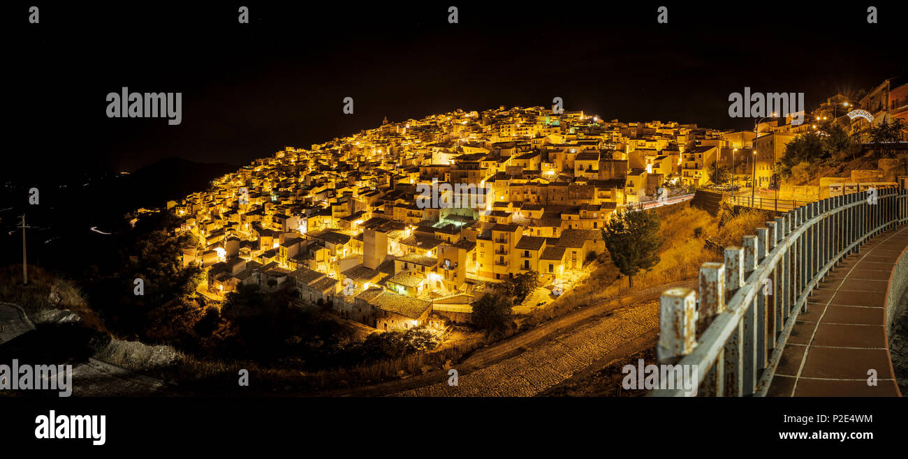 Nocturnal panoramic view of Prizzi, a typical village located in the ...
