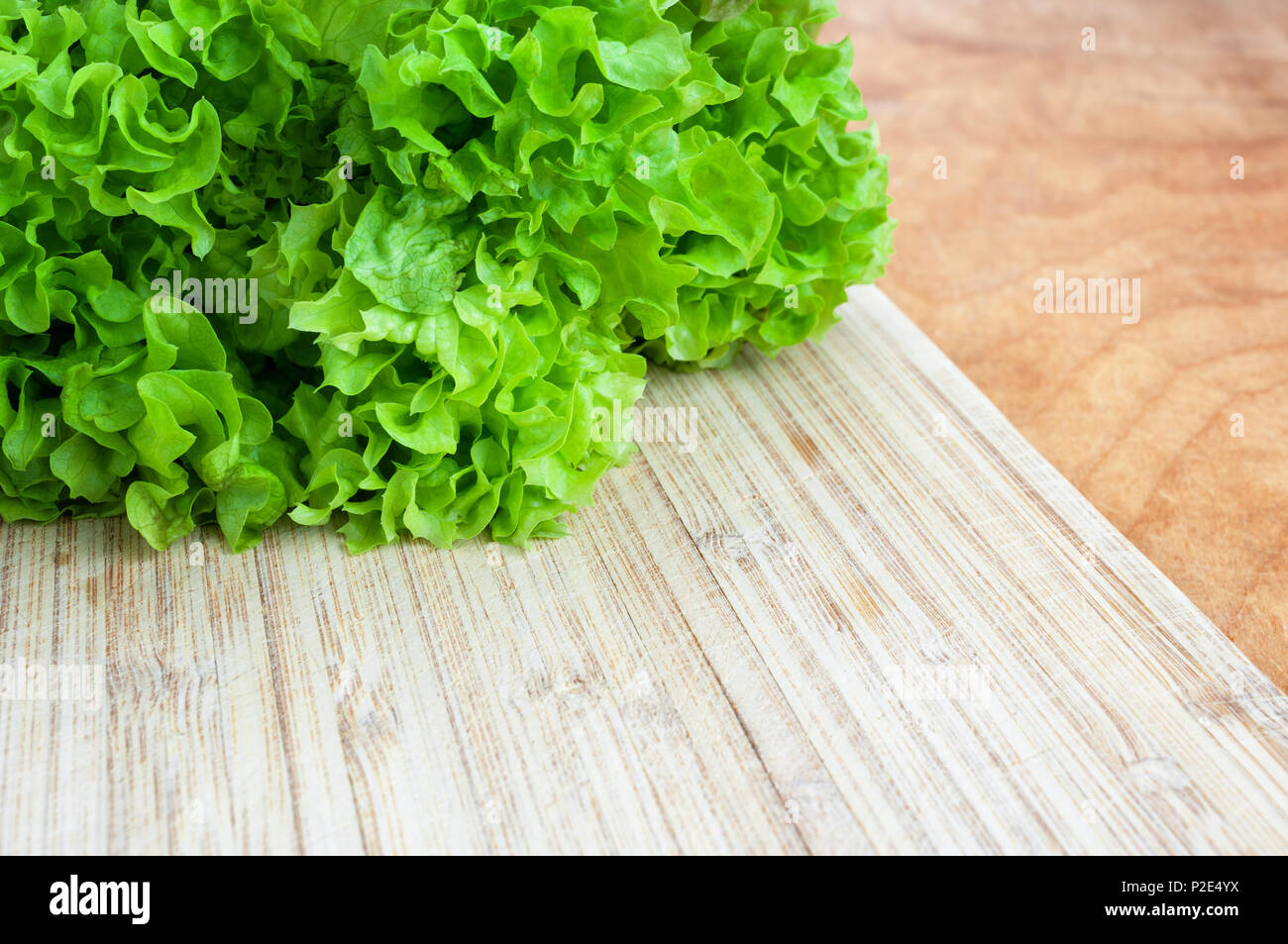 Fresh lettuce on wooden background Stock Photo - Alamy